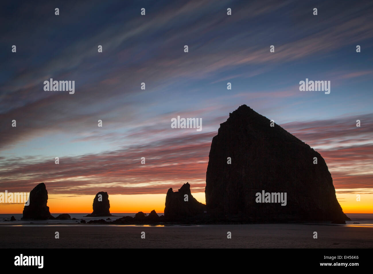 Sunset over Haystack Rock at Cannon Beach Oregon, USA Stock Photo - Alamy