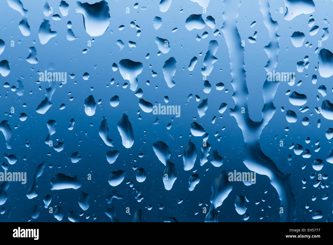 Rain droplets on a window Stock Photo - Alamy