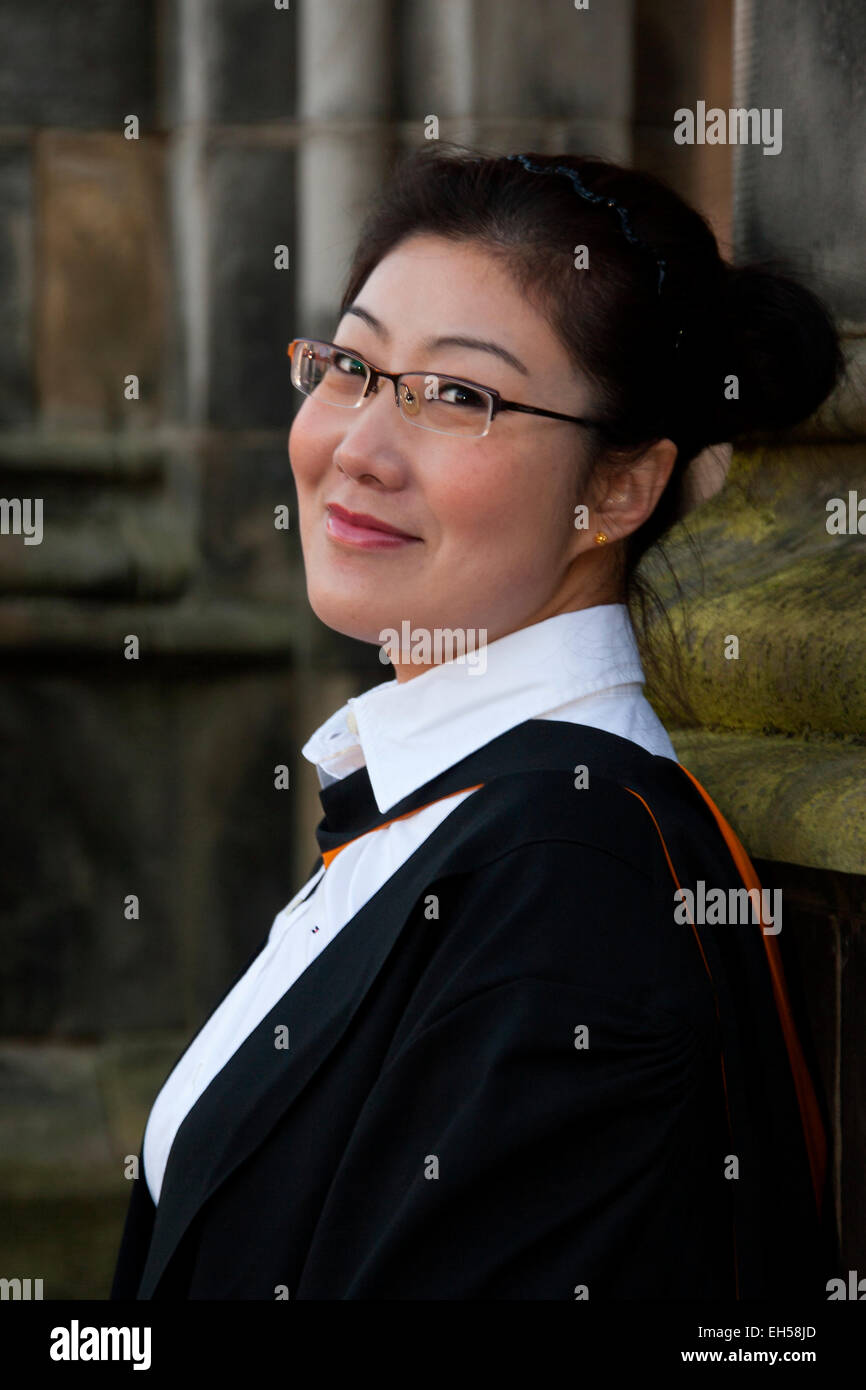 Cheerful Asian female student on Graduation Day at the St Andrews ...
