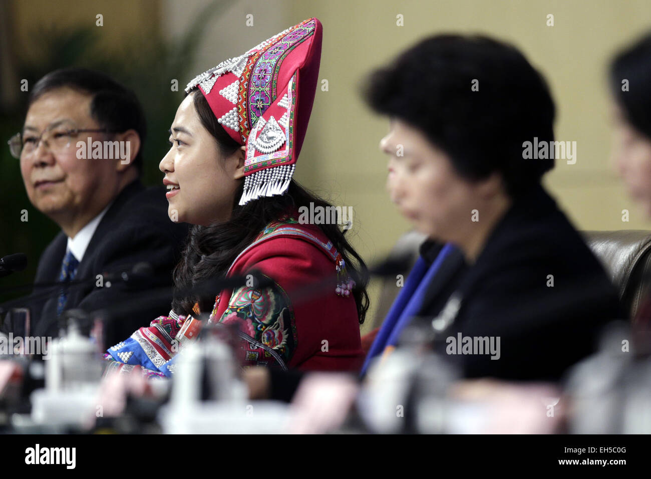 Beijing, China. 7th Mar, 2015. Li Xinrong (2nd L), a deputy to China's ...