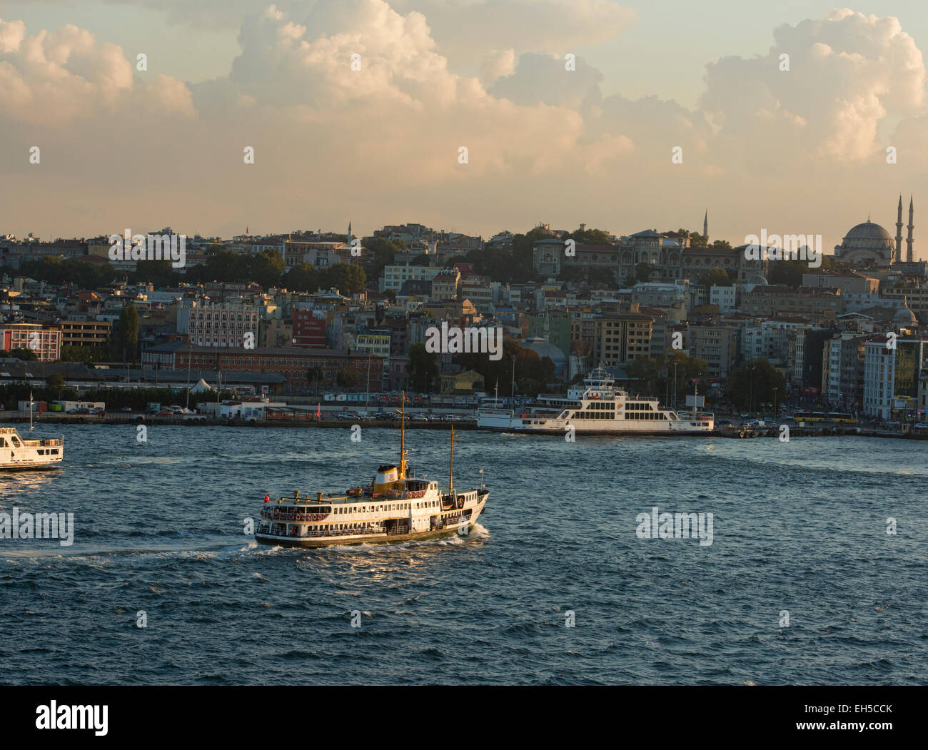 Istanbul, Turkey ferry boat shore Bosphorus strait sunset Stock Photo ...