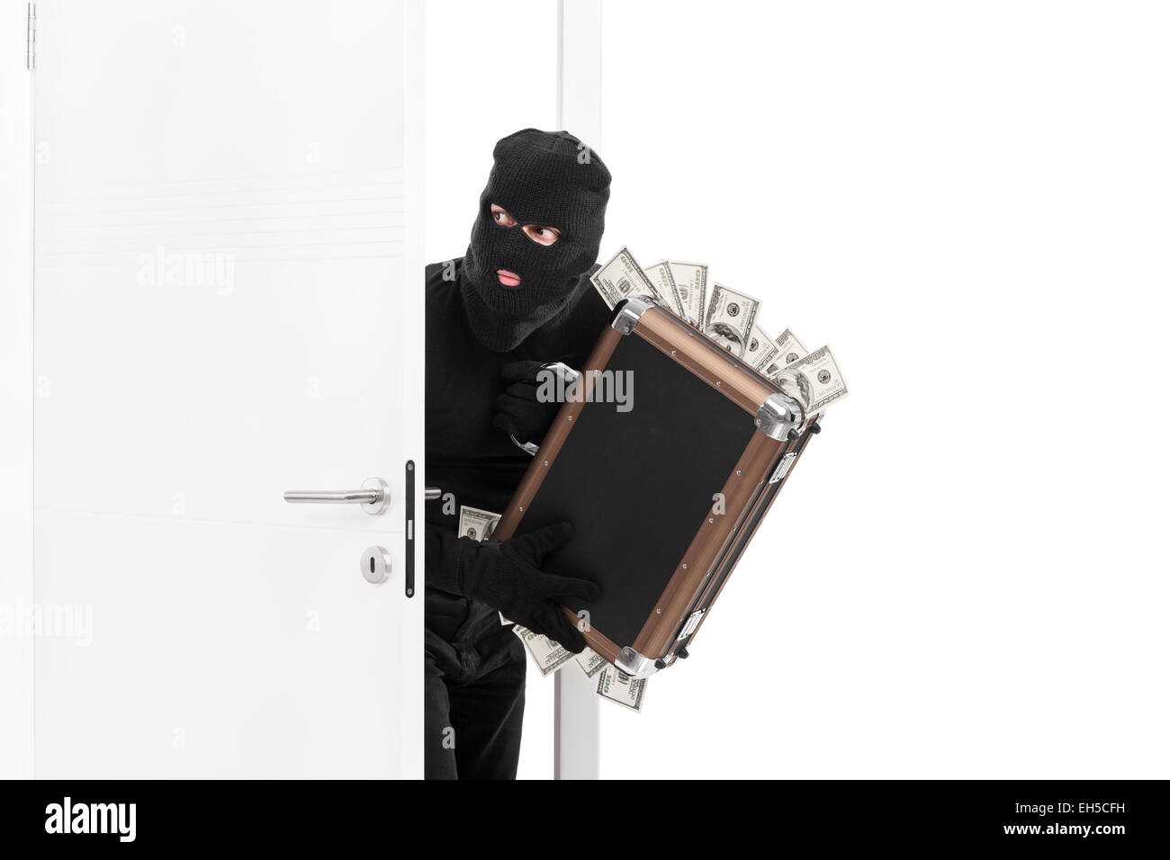 Thief with a bag full of money entering a room isolated on white ...