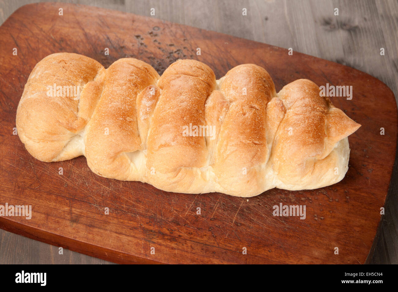 Traditional wheat bread on a timber board Stock Photo - Alamy