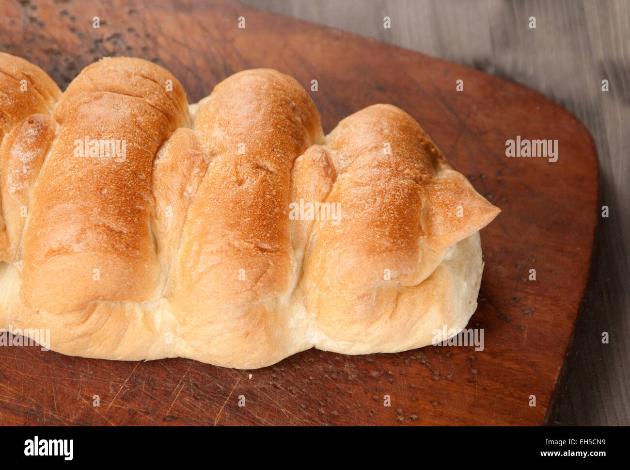 Traditional wheat bread on a timber board Stock Photo - Alamy