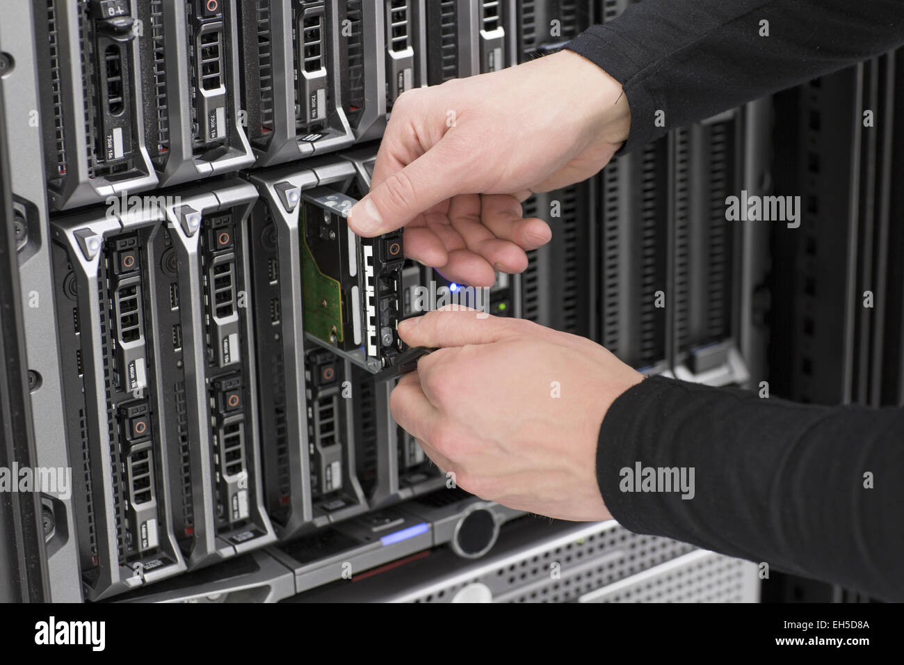 It engineer / technician working in a data center. Replace a local hard ...