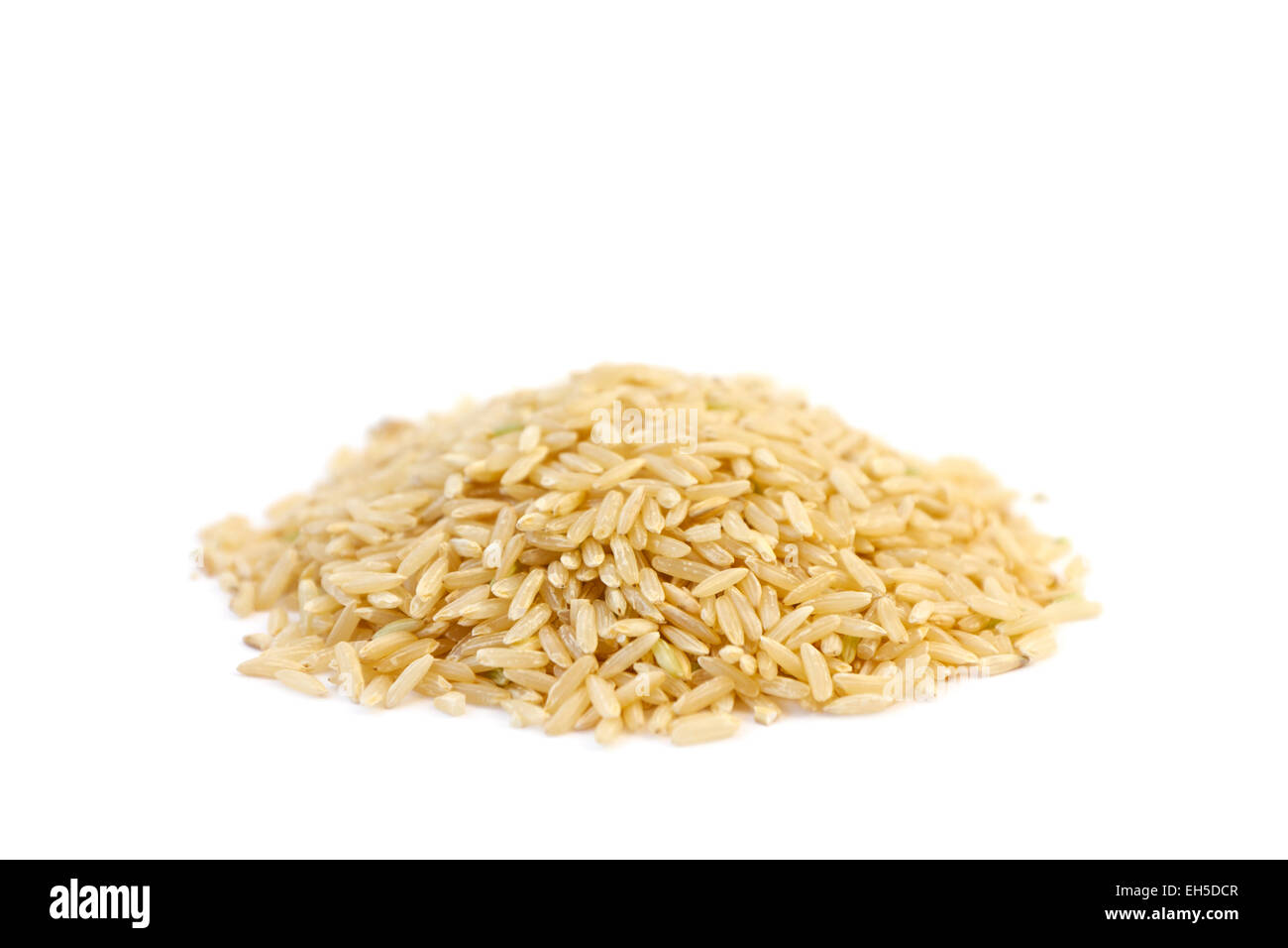 Raw and organic natural rice on white background. Not bleached Stock ...