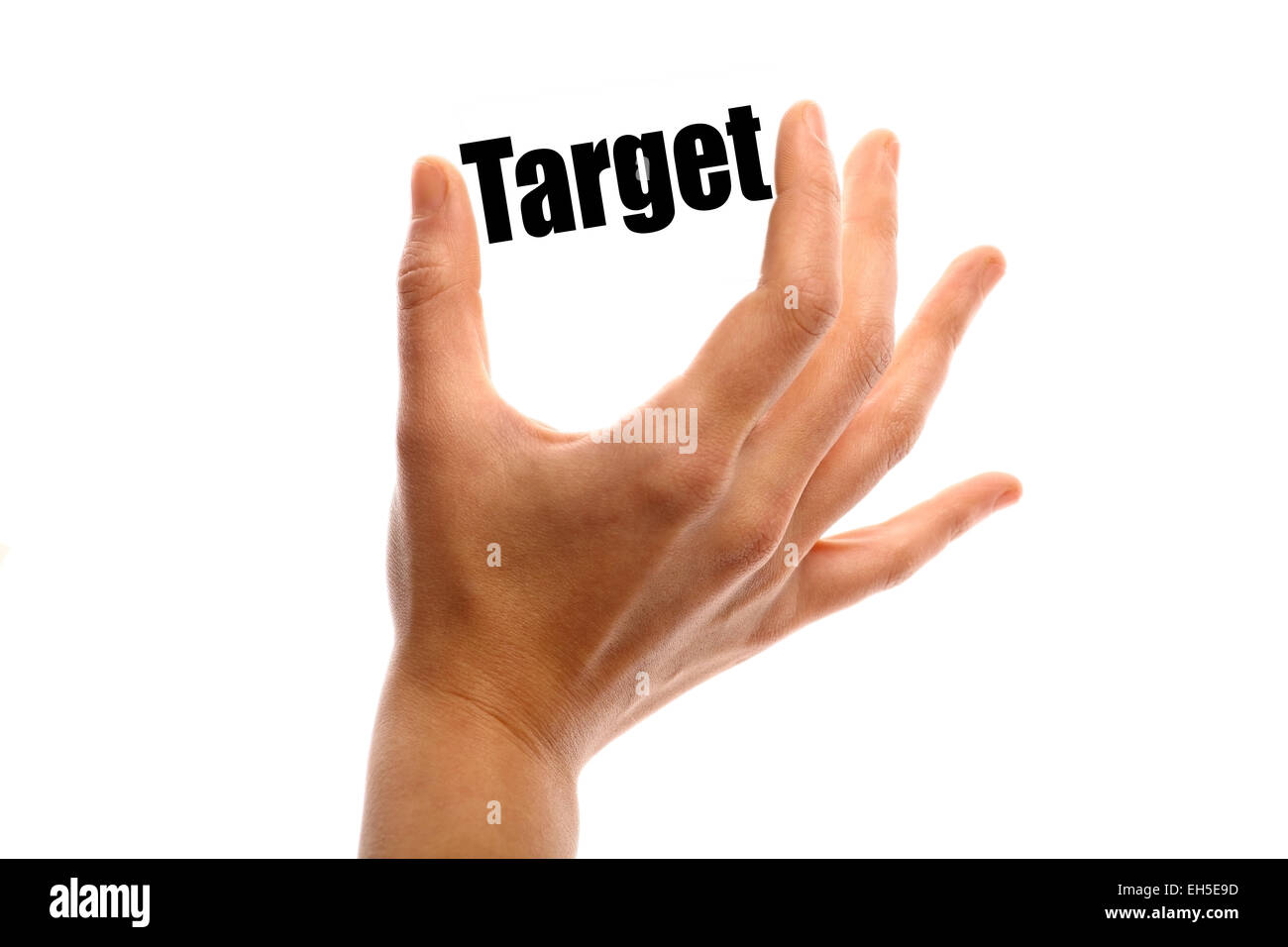 Horizontal shot of a hand holding the word "Target" between two fingers ...
