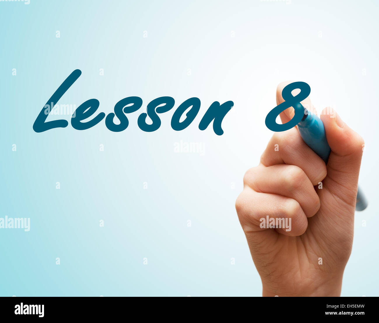 Hands with pen writing on screen lesson 8 Stock Photo - Alamy