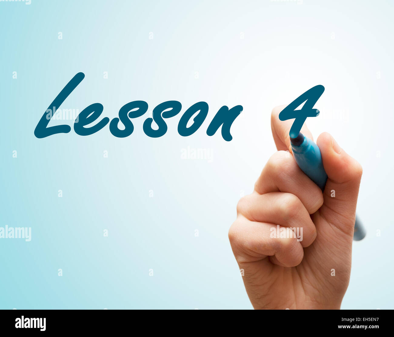 Hands with pen writing on screen lesson 4 Stock Photo - Alamy