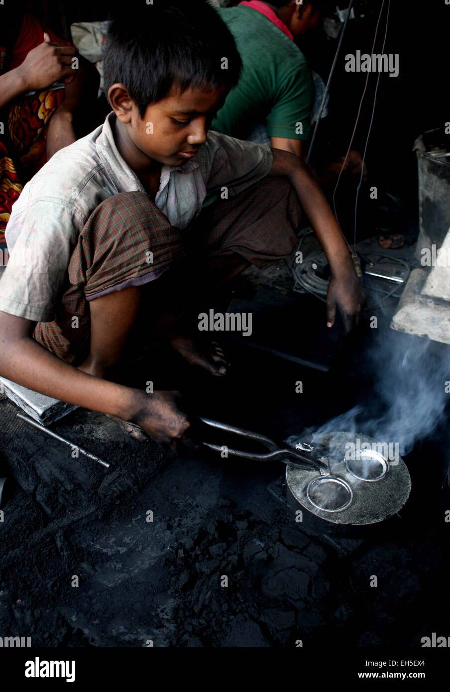 Child Workers at a steel recycling and re-rolling mill in Dhaka Stock ...