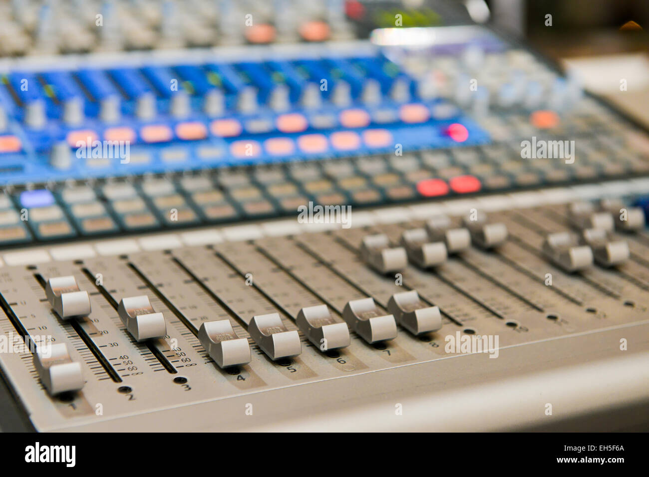 Equalizer instrument with a lot of buttons and presets Stock Photo - Alamy