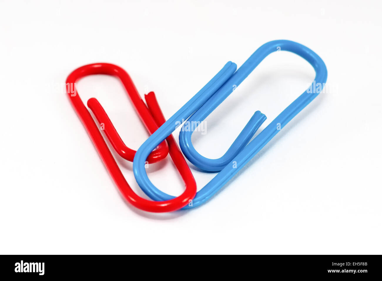 Blue plastic paperclip Cut Out Stock Images & Pictures - Alamy