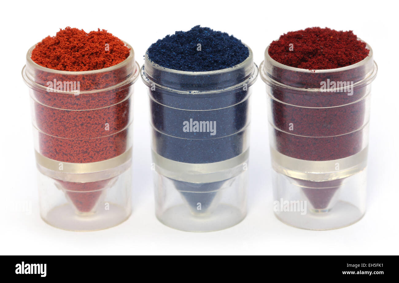 Textile color powder on plastic pots Stock Photo - Alamy