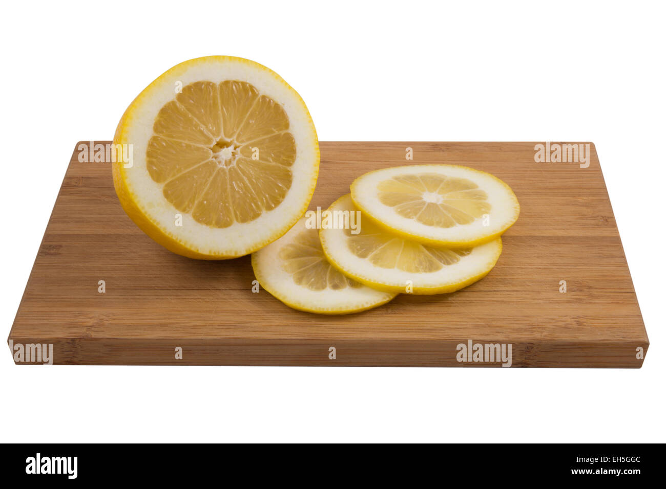 Lemon on a board Stock Photo - Alamy