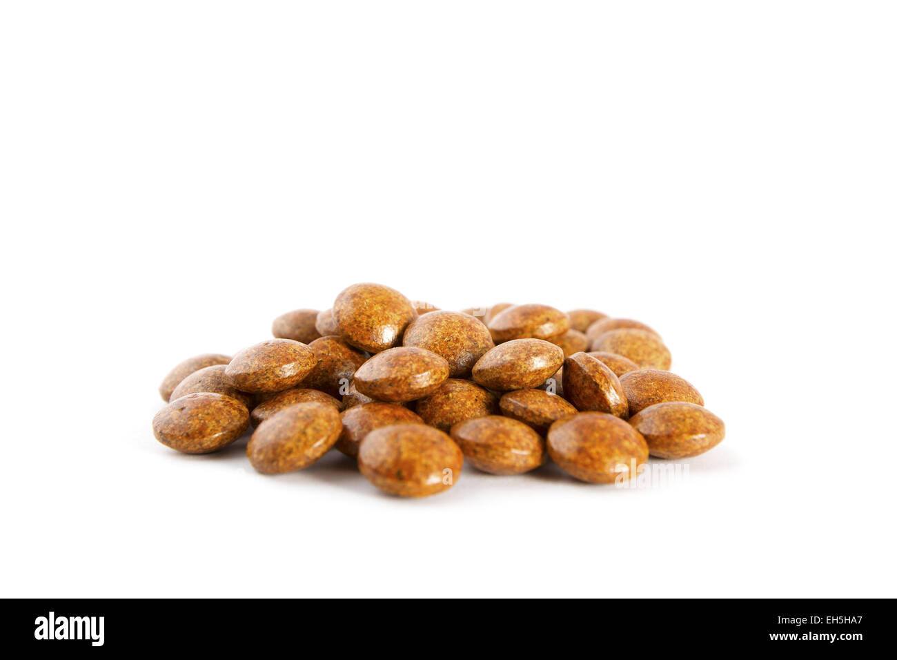 Side view of multivitamin tablets on white background Stock Photo - Alamy