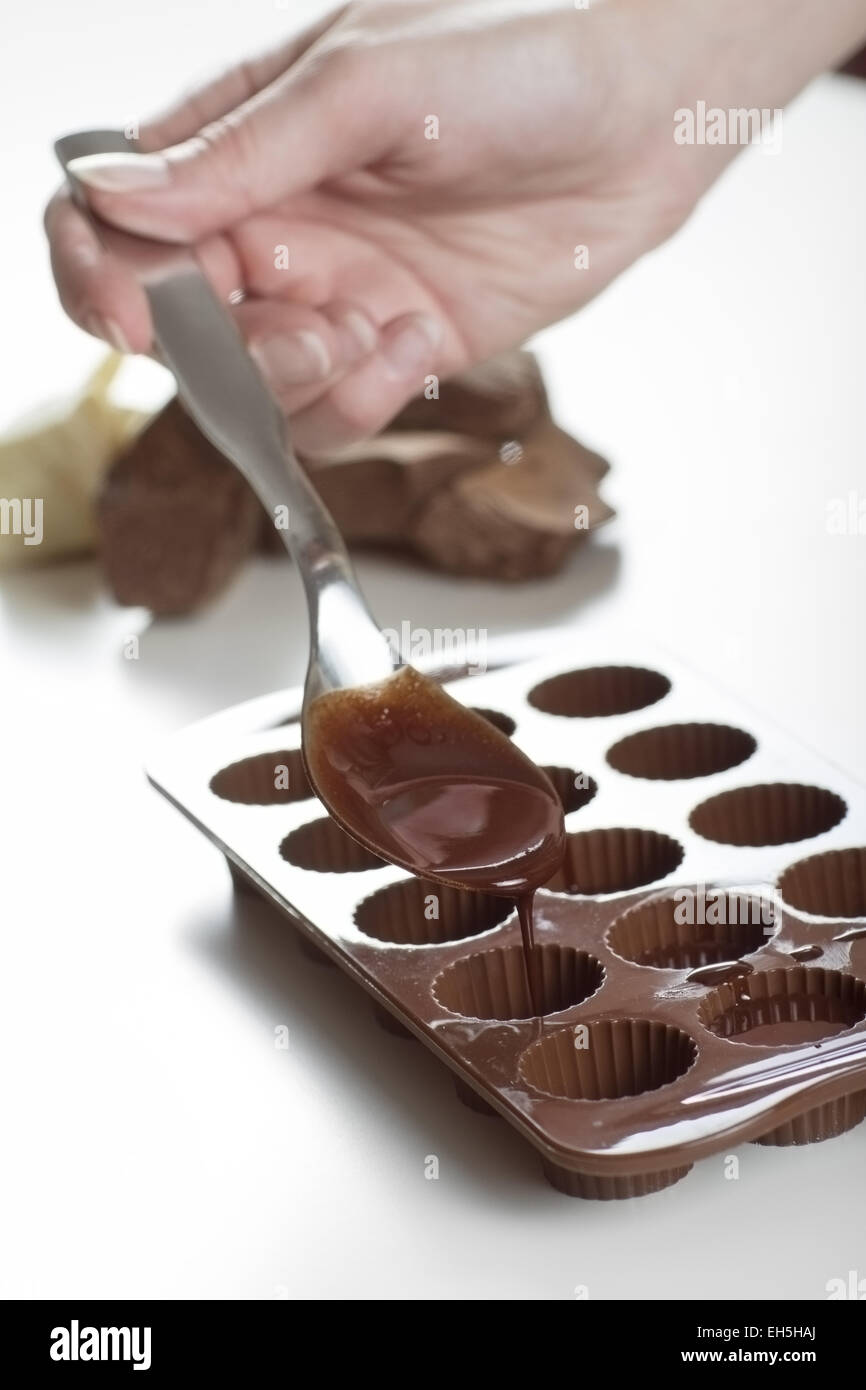 Woman making raw organic chocolate confectionery Stock Photo - Alamy