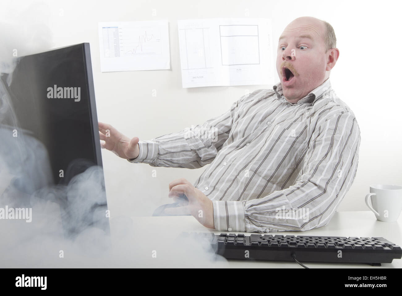 Office worker / businessman with computer problems or very fast ...