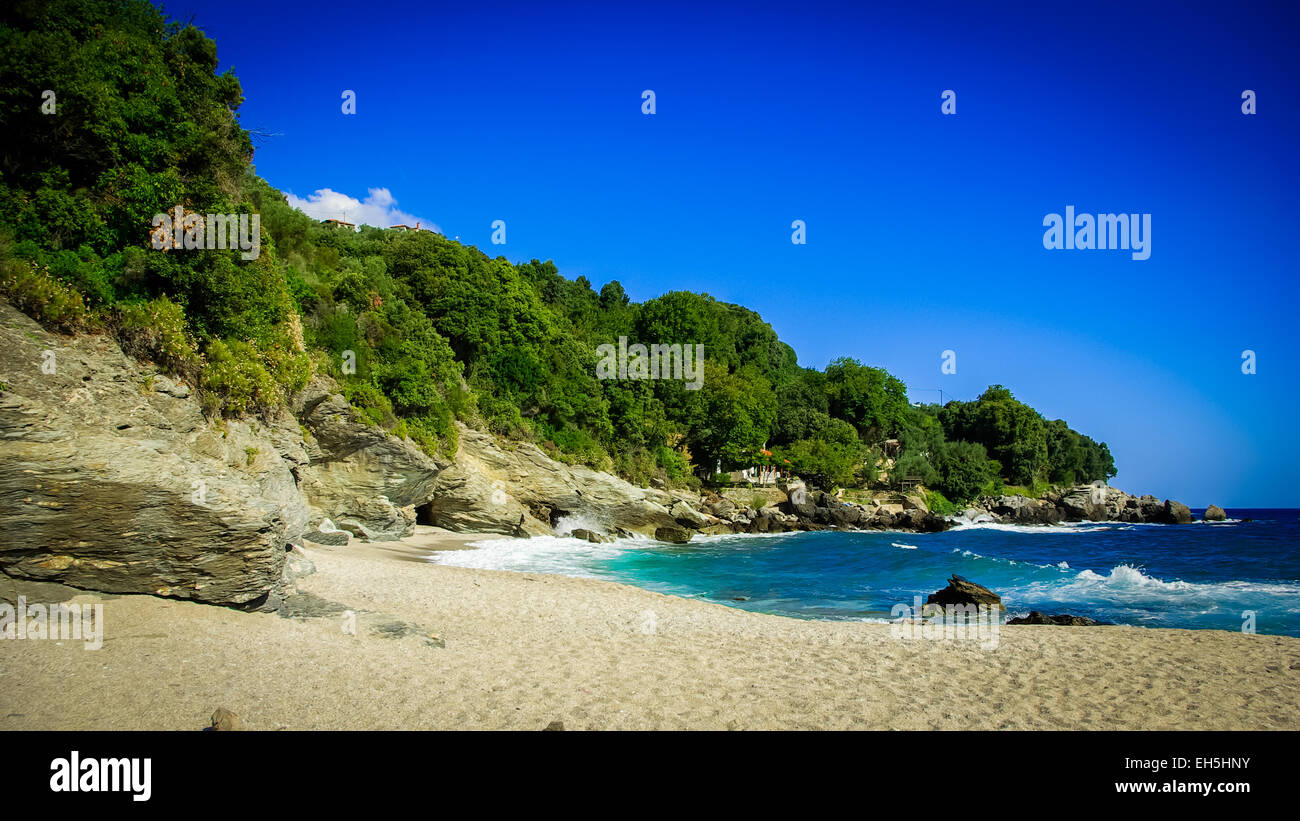 Plaka beach, Pelion, Greece. Sandy beach with rocks in Pilio, Greece ...