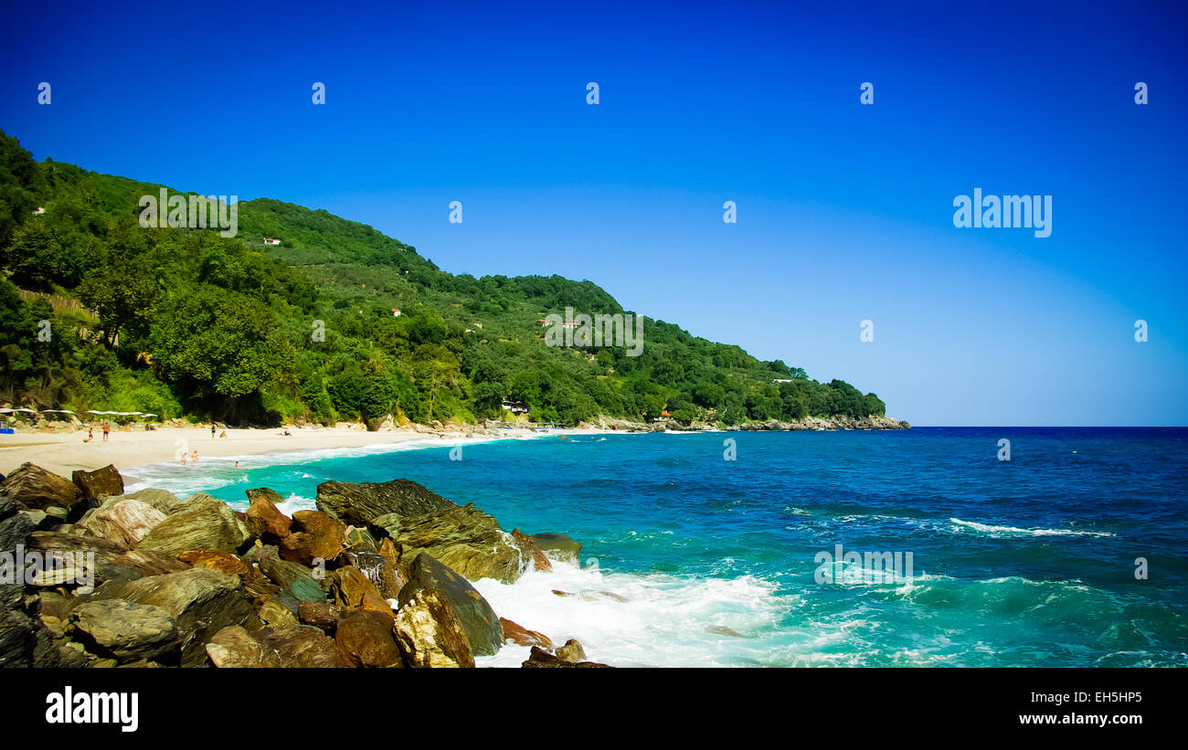 Plaka beach, Pelion, Greece. Sandy beach with rocks in Pilio, Greece ...