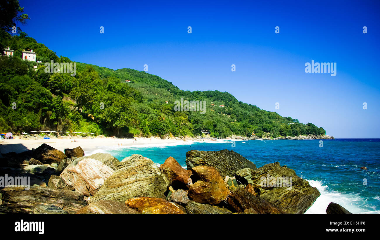 Plaka beach, Pelion, Greece. Sandy beach with rocks in Pilio, Greece ...