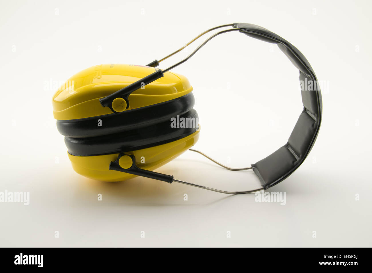 yellow ear protection, safety devices Stock Photo - Alamy