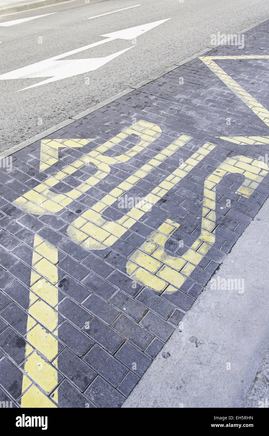 Bus signal on asphalt, detail of signal information, public transport ...