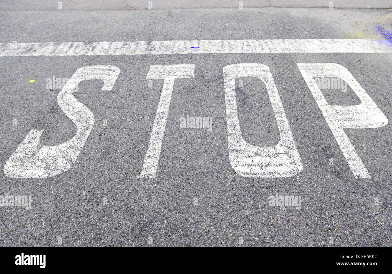 Stop sign on asphalt, detail of a traffic signal, security and ...