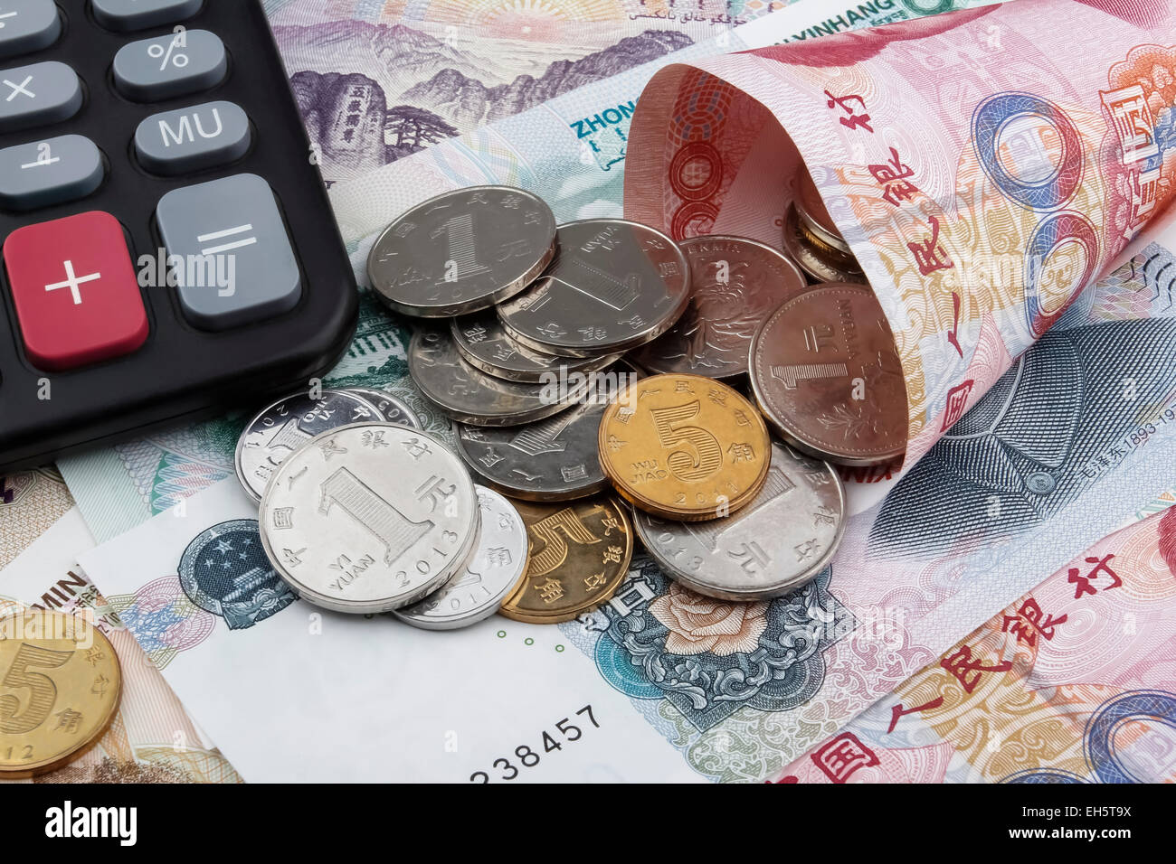 Chinese money (RMB) notes, coins and a calculator Stock Photo - Alamy