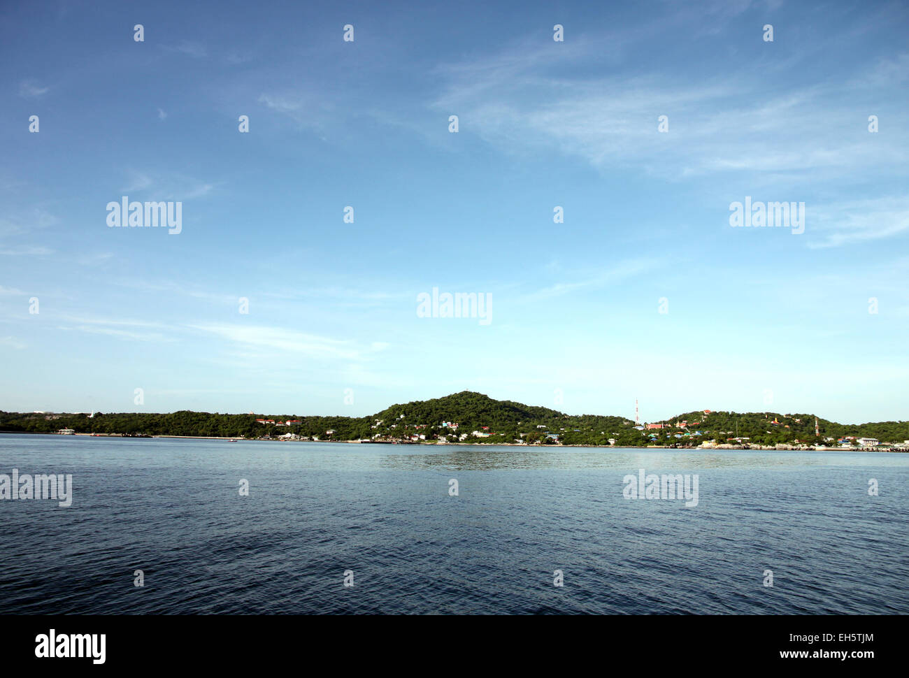 sea and coast on a clear day have a blue sky background Stock Photo - Alamy