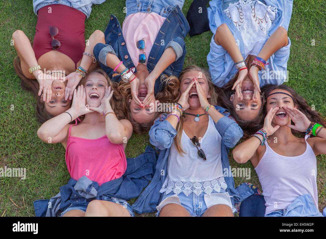 group of kids shouting or singing with cupped hands Stock Photo - Alamy