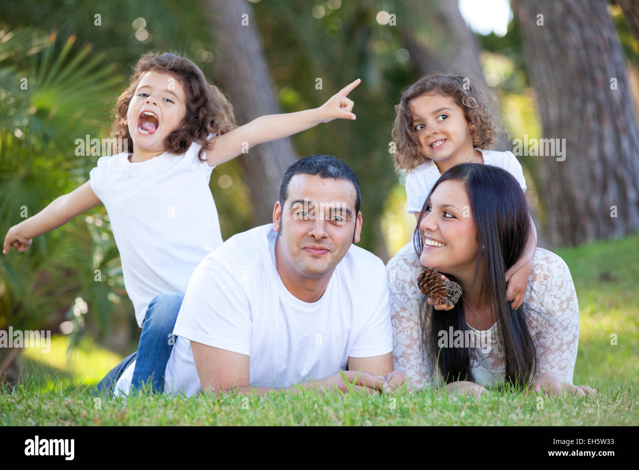 happy smiling Hispanic family parents and children Stock Photo - Alamy