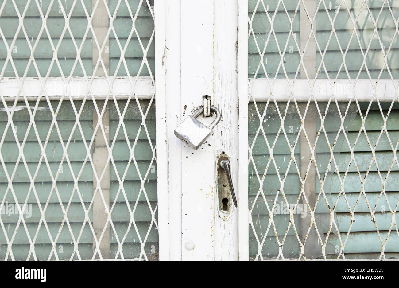 Old metal railing detail of a grid safety, security Stock Photo - Alamy