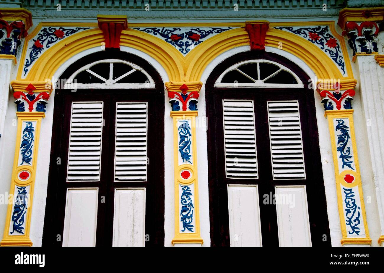 Melaka, Malaysia: Brightly painted pargetted plasterwork pilasters ...