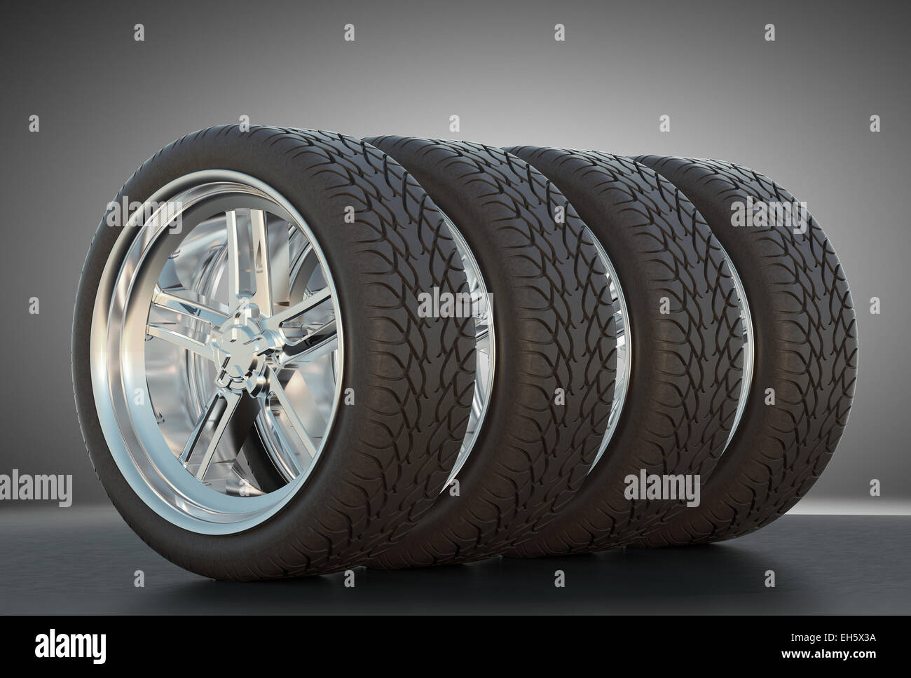 Group of four automotive wheels with studio light background Stock ...