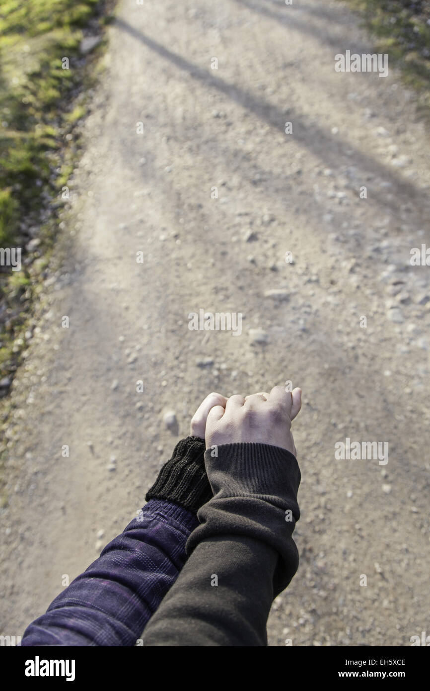 Hands of a loving couple, detail of a folded hands, love and affection ...