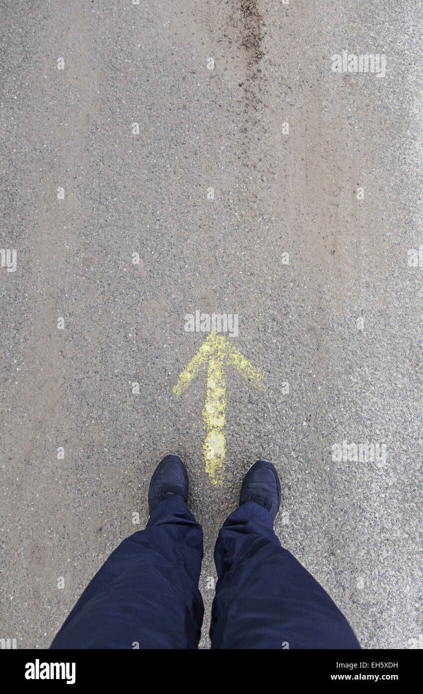Feet in front of an arrow hi-res stock photography and images - Alamy