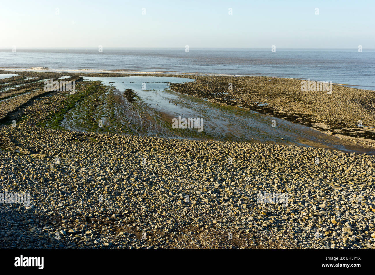 Stones and slabs at low tide on Lilstock beach, Somerset Stock Photo ...