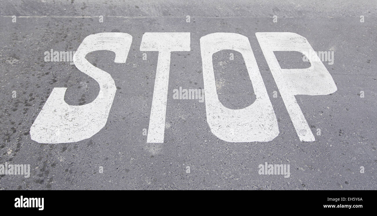 Stop sign on asphalt, detail of a traffic signal, security and ...