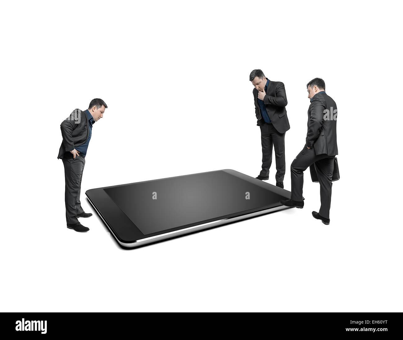 Businessmen take counsel, looking at huge display of tablet computer ...