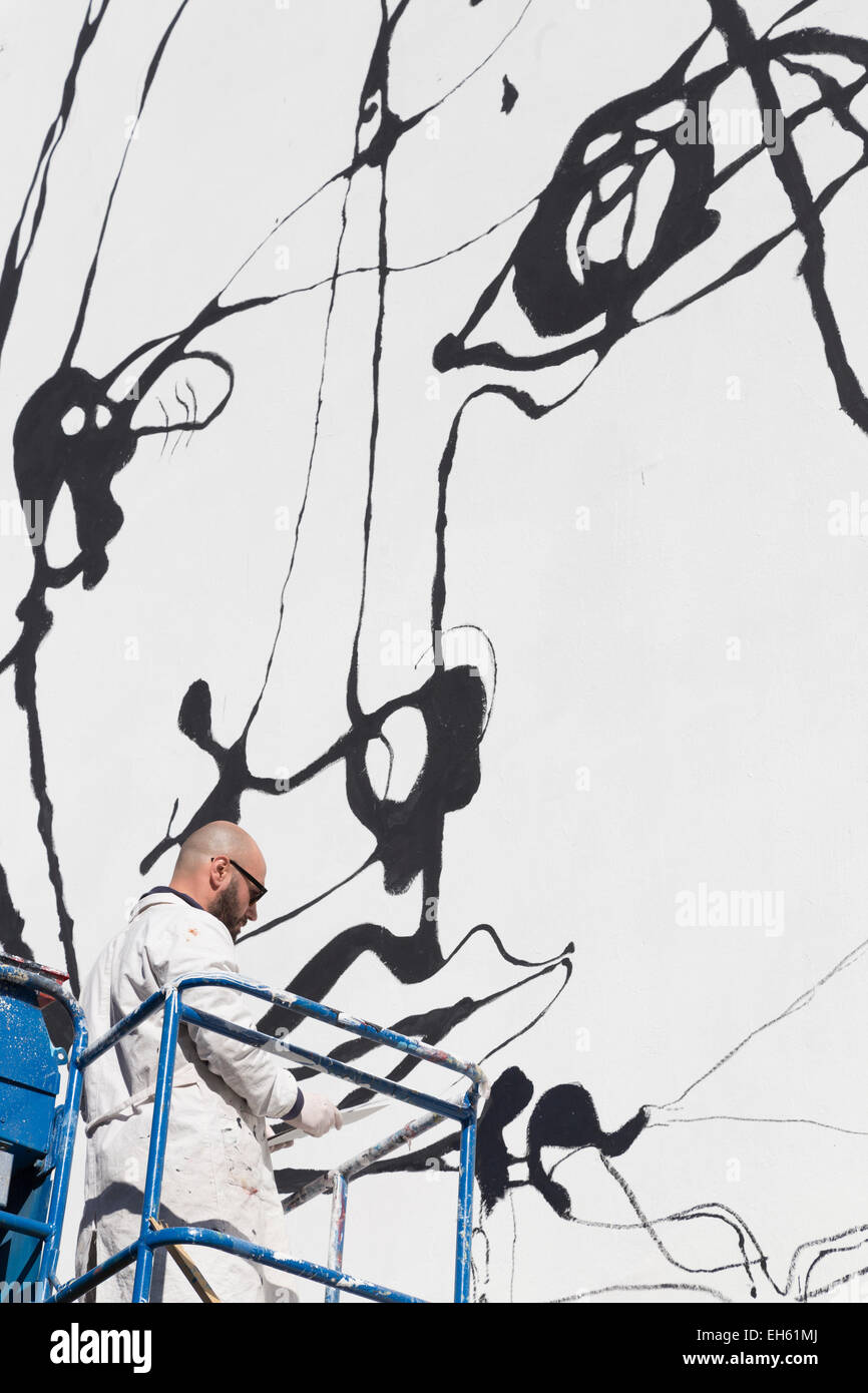 Rome, Italy. 07th Mar, 2015. Danilo Bucchi, italian artist, is painting ...
