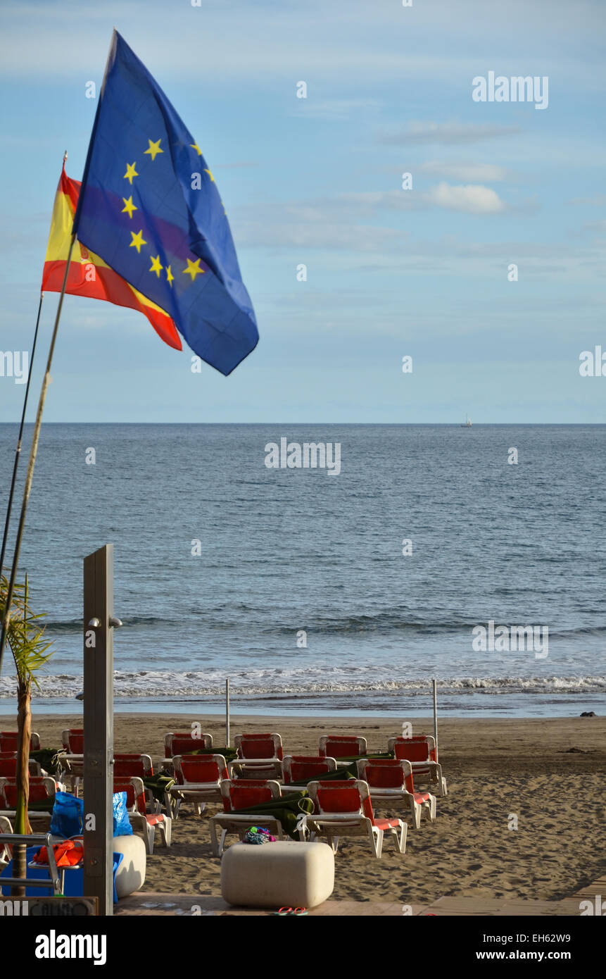 Colorful flags at the beach by the resort San Augustin at the island ...