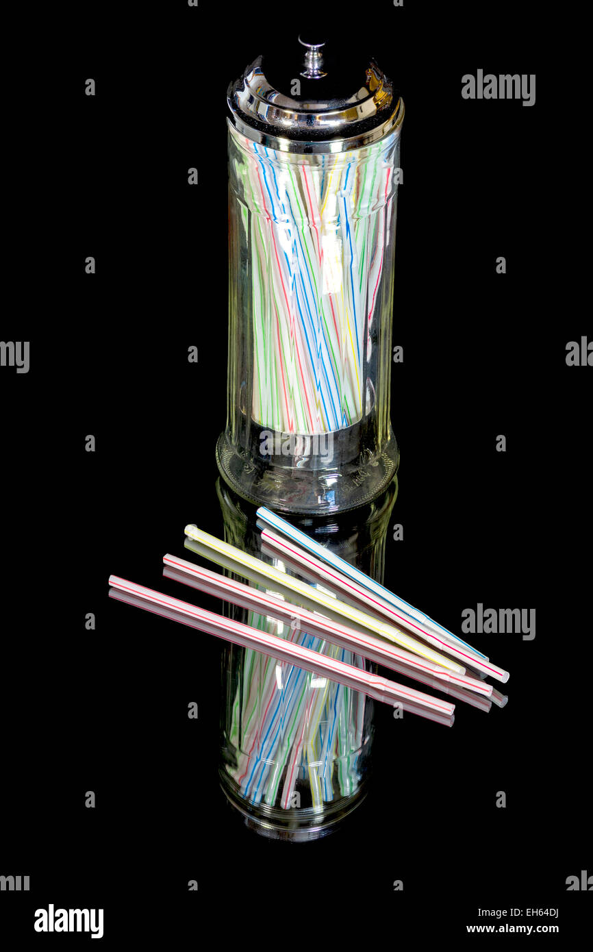 Straws and straw holder with reflection Stock Photo - Alamy