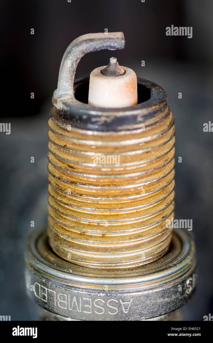 Single spark plug close up Stock Photo - Alamy