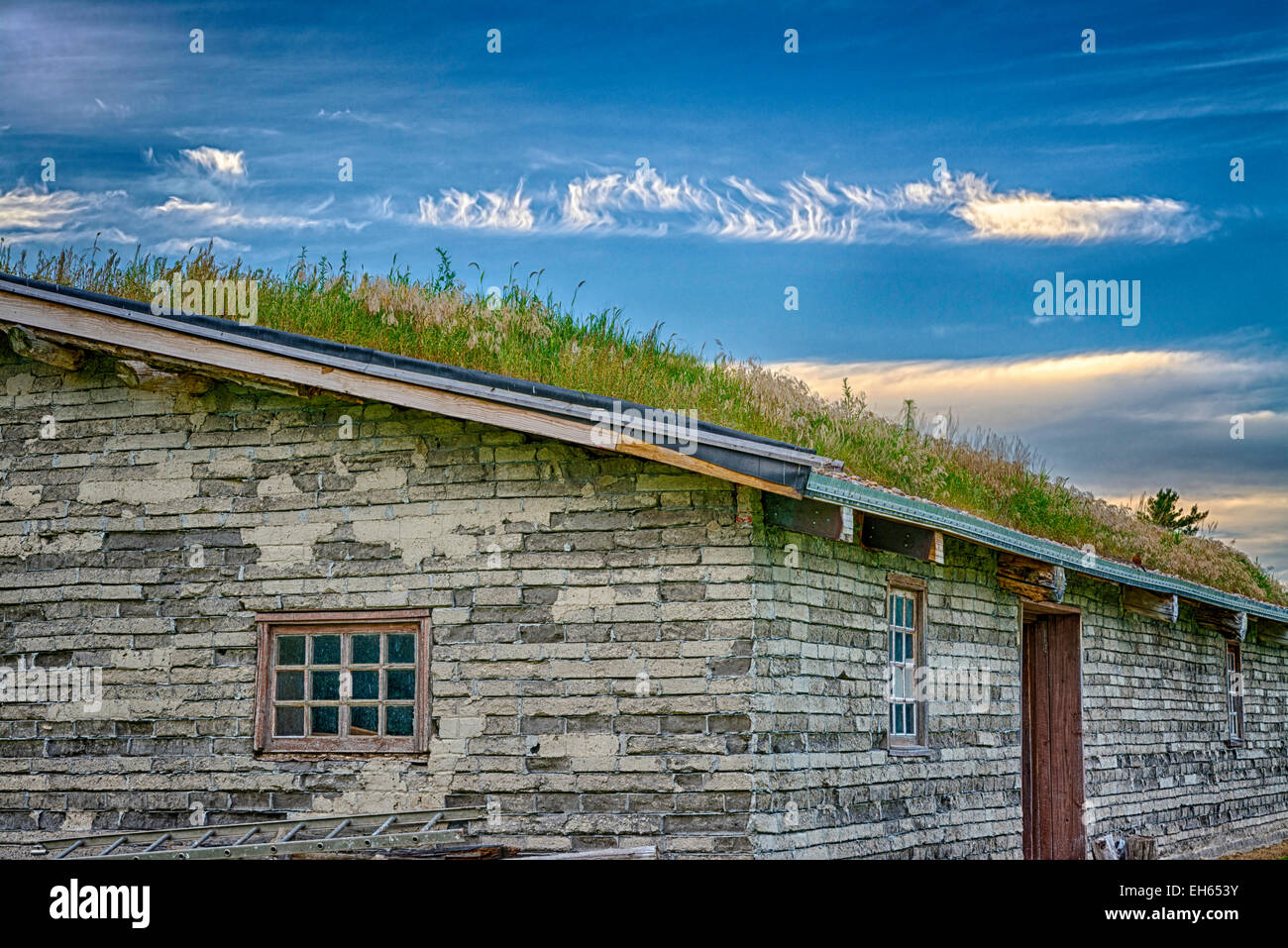 Farm bunkhouse with a morning sky Stock Photo - Alamy