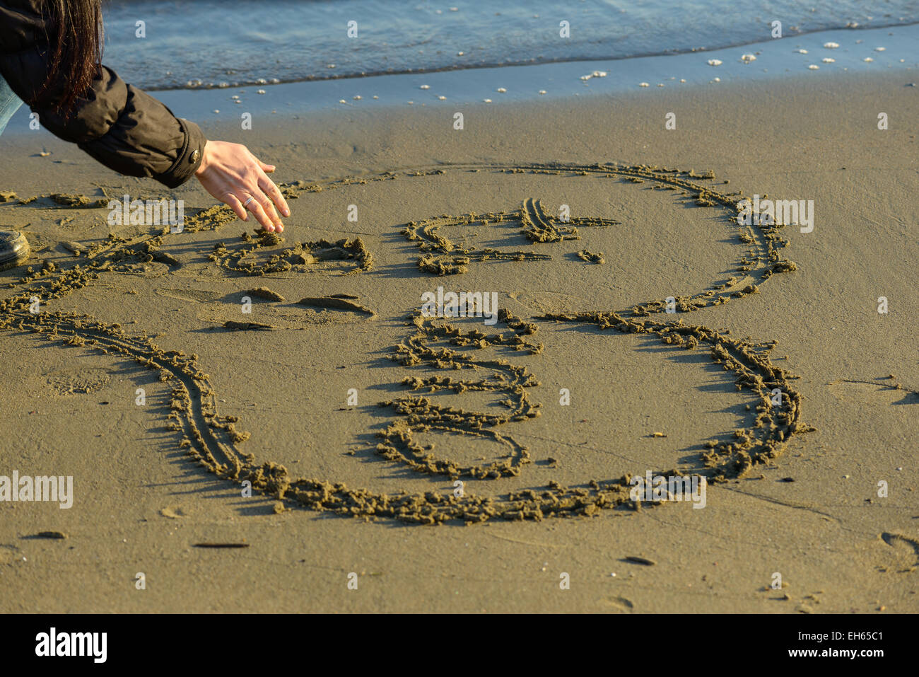 Drawing with sand hi-res stock photography and images - Alamy