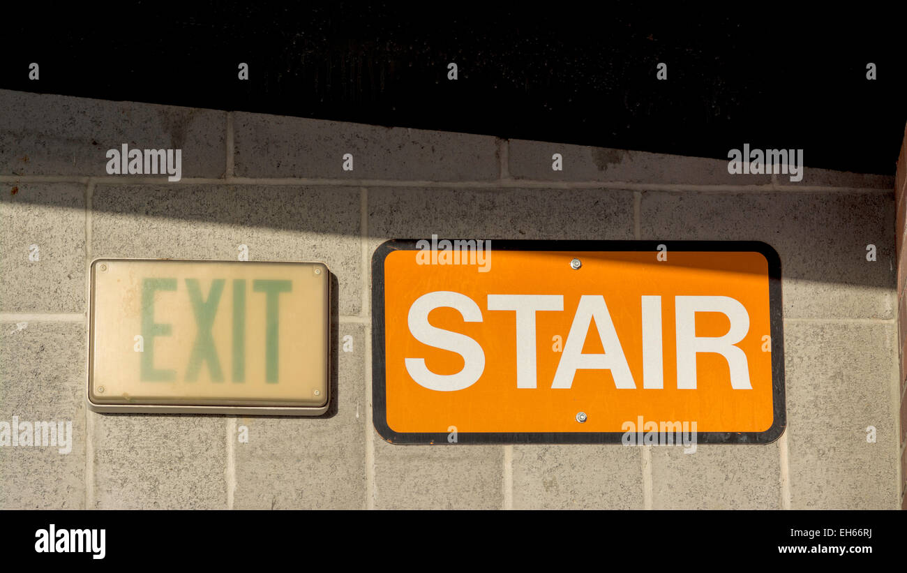 Two signs at a parking garage Stock Photo - Alamy