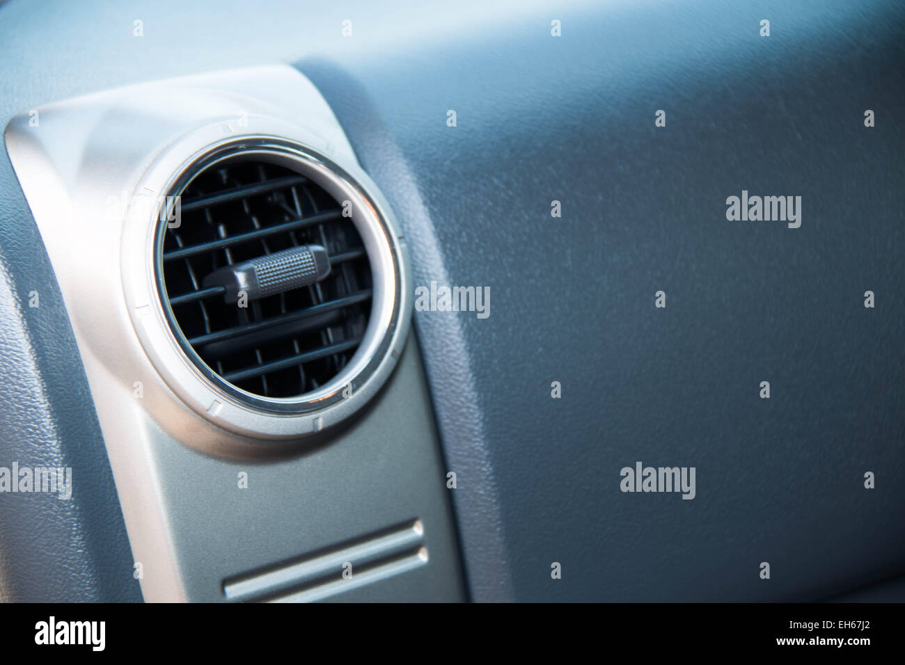 Closeup of an air vent for controlling airflow in an automobile Stock ...