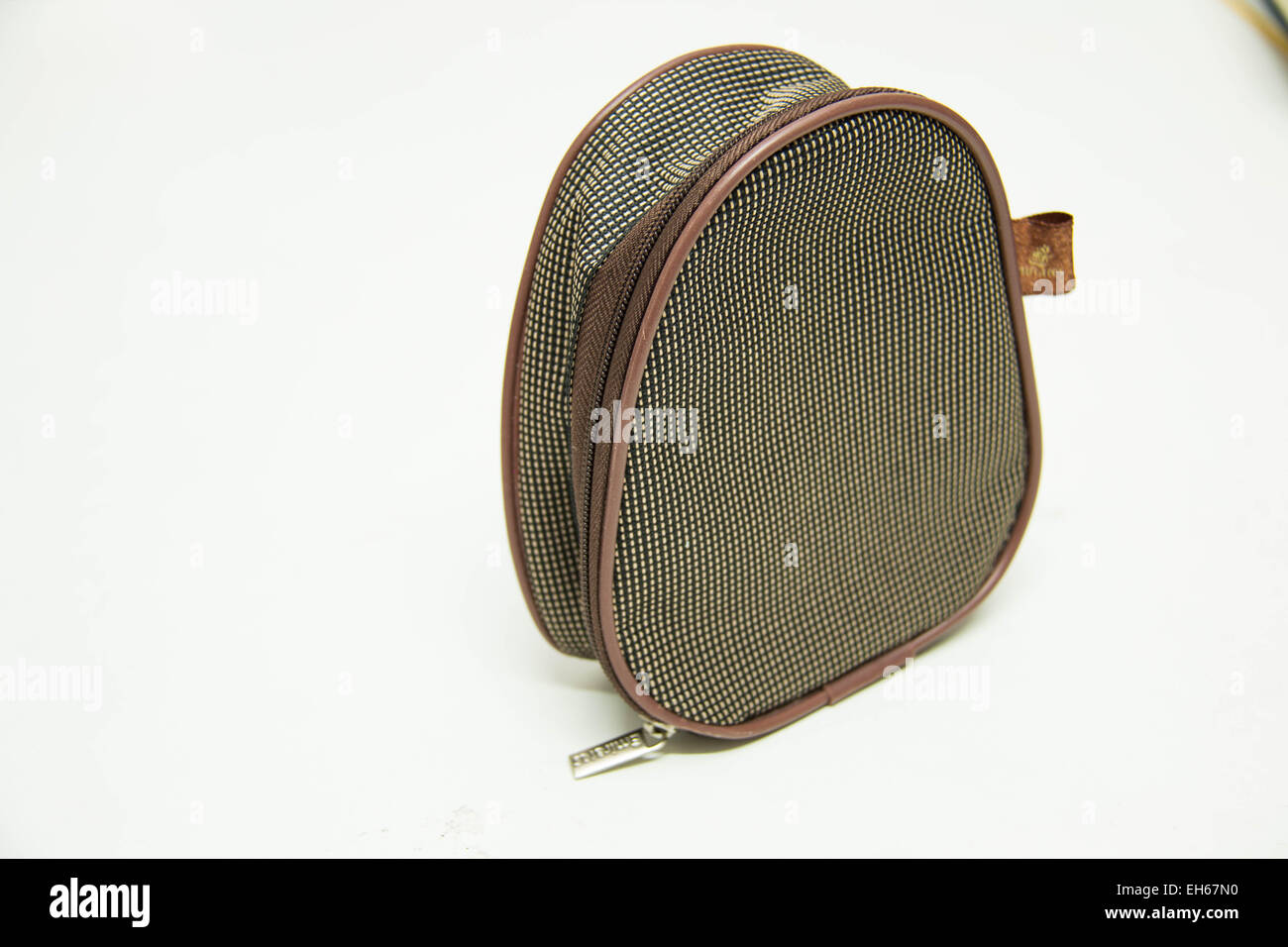A Small leather empty open bag case Stock Photo - Alamy