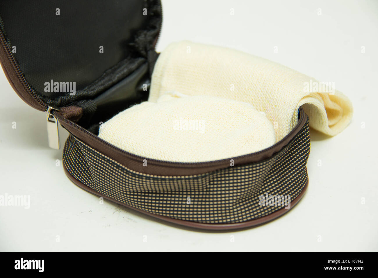 A Small leather empty open bag case Stock Photo - Alamy