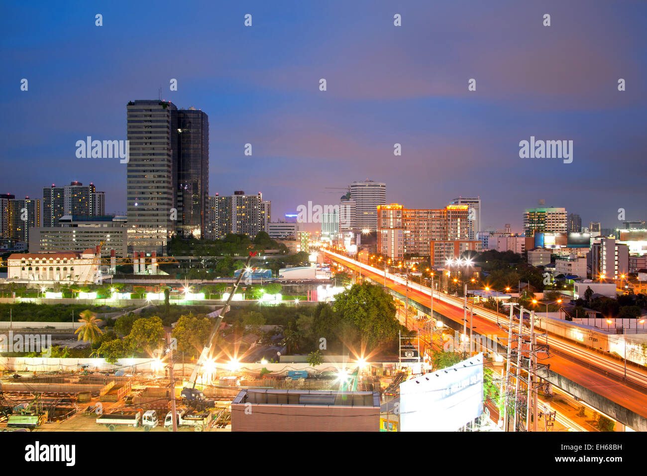 Aerial view of Bangkok Highway and building at downtown area at dusk ...